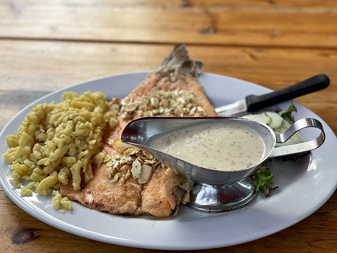 Trout that looks like it jumped from stream to plate, wearing nothing but a light dusting of almonds and a splash of sauce. Fish perfection.
