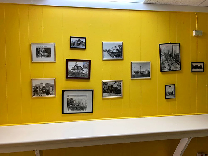 The yellow walls adorned with historic Raleigh photos remind diners they're part of a continuing community story spanning generations.
