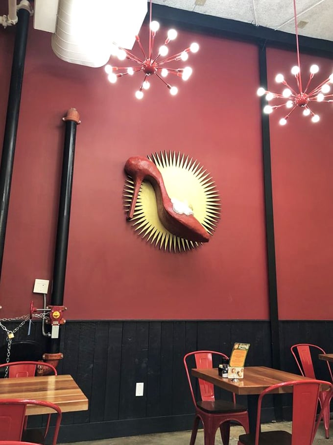 The whimsical wall art and starburst lighting create an atmosphere that says, "Yes, breakfast can actually be this exciting."