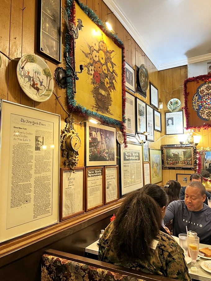 The walls don't just display memorabilia&mdash;they're telling stories of decades of coffee spills, neighborhood gossip, and New York history one framed clipping at a time.