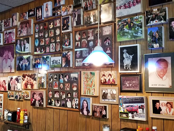 The wall of memories isn't decoration&mdash;it's the restaurant's heart on display. Each photo frame tells a chapter in the Uncle Harry's story.
