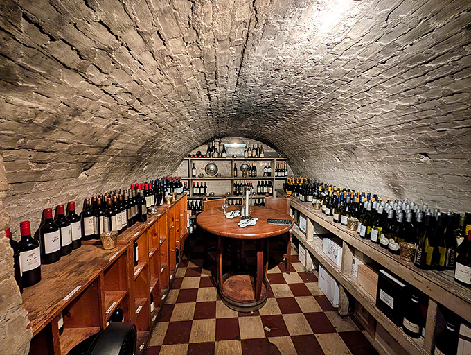 A wine cellar worthy of a treasure map&mdash;brick arches housing bottles that range from "special occasion" to "selling a kidney to afford this."