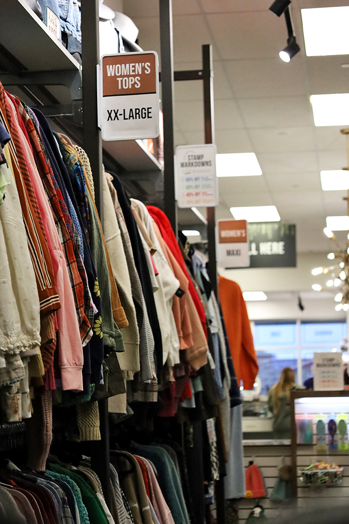 Women's tops are organized by size, proving that whoever designed this store understands the special circle of retail hell that is hunting for your size.