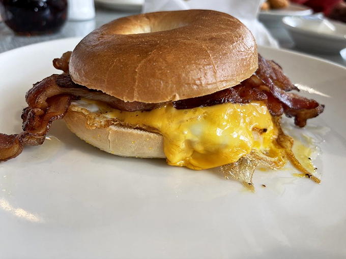 The breakfast bagel sandwich that makes you understand why New Yorkers won't shut up about their bagels. Pure morning magnificence.