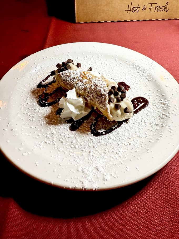 A cannoli that doesn't need to boast about its Sicilian heritage&mdash;the chocolate-drizzled shell and creamy filling speak eloquently enough.