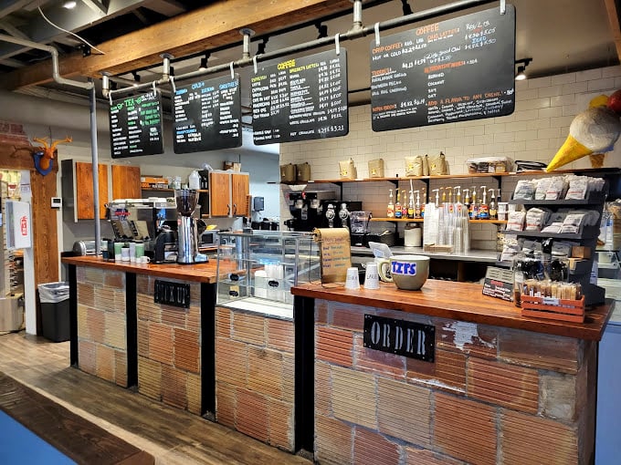 Not just a coffee counter but a refueling station for the mind, where literary journeys pause for necessary sustenance.