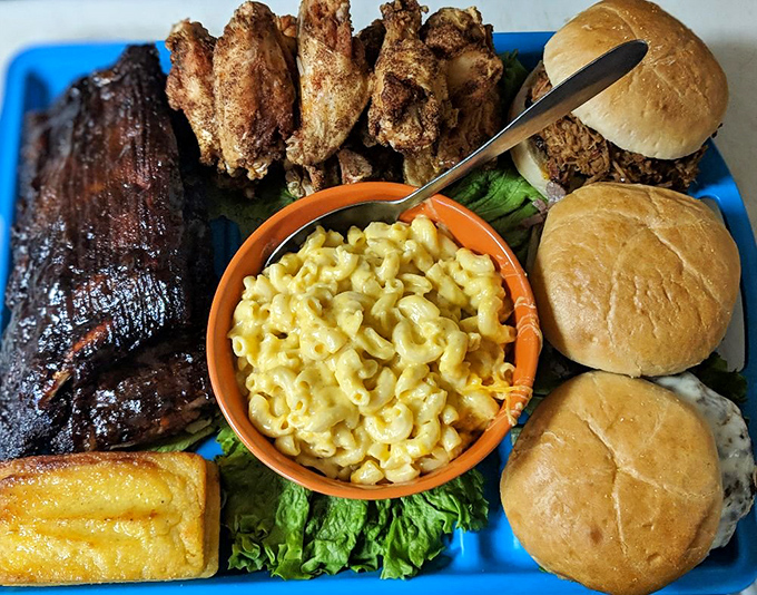 The barbecue sampler that makes decisions unnecessary. Brisket, chicken, mac and cheese, and rolls&mdash;because sometimes "all of the above" is the only right answer.