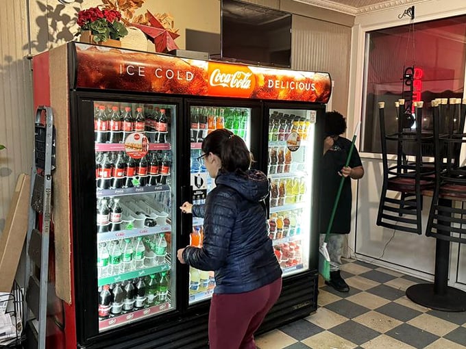 Even the drink selection gets the royal treatment. That Coca-Cola cooler isn't just storing beverages&mdash;it's preserving potential happiness in bottled form.