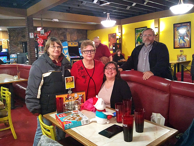 Where memories are made between bites of pizza. The red booths have witnessed countless birthday celebrations, first dates, and "just because" gatherings.