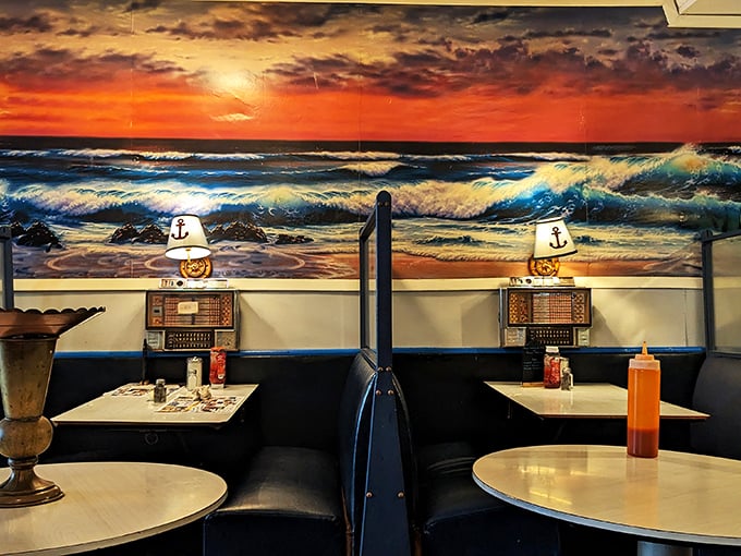 The dramatic ocean painting isn't just d&eacute;cor&mdash;it's practically a dining companion, watching over countless meals and midnight confessions.