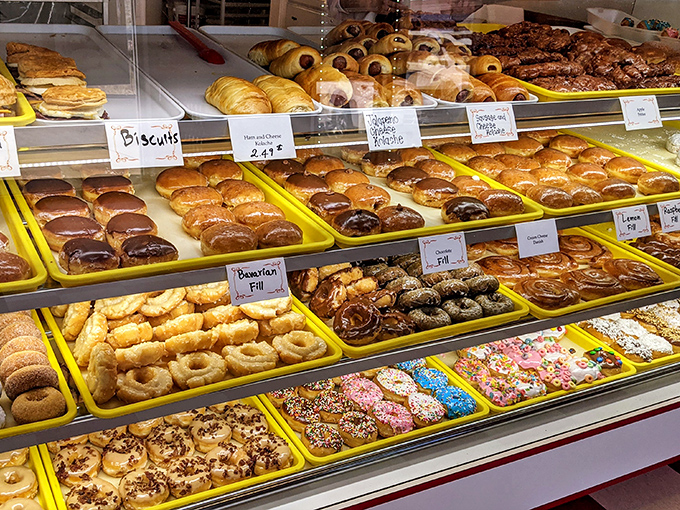 Trays of golden, glazed perfection await their destiny. This display case is the South Carolina equivalent of the Louvre.