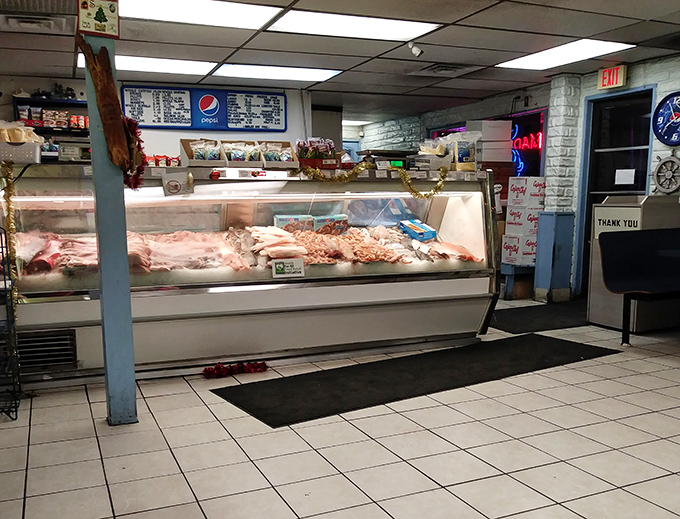 The display case showcases the day's fresh offerings&mdash;a glistening array of seafood that makes choosing just one item nearly impossible.