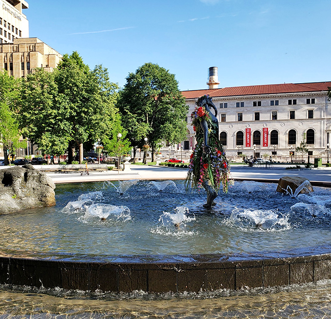 Outside in Rice Park, the fountain creates a peaceful counterpoint to the Landmark's imposing architecture&mdash;urban serenity at its finest.