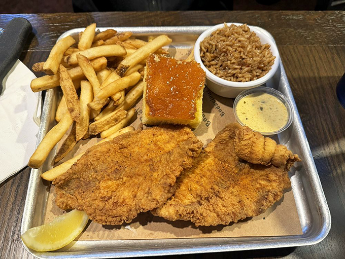 Golden-fried catfish that crackles with each bite, served with sides that know their supporting role but steal scenes anyway. 