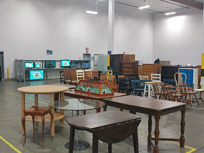 Furniture island &ndash; where dining tables from different decades come to meet. That drop-leaf beauty on the left has hosted countless family dinners.