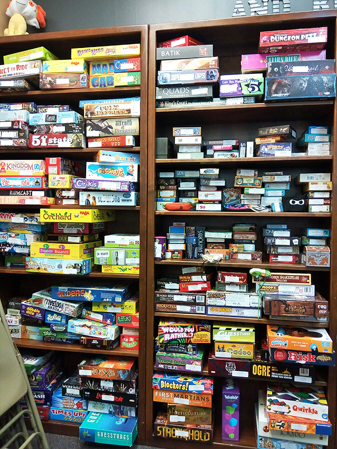 The board game collection rivals specialty shops, with everything from casual party games to hardcore strategy experiences stacked nearly to the ceiling.