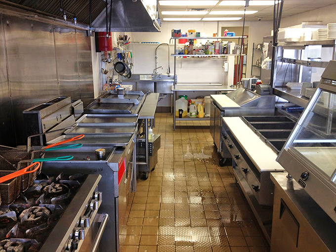 Kitchen: The well-worn kitchen tells stories of thousands of meals served &ndash; a testament to consistency and culinary craftsmanship.