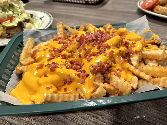 Cheese fries that don't mess around. When melty cheese and bacon bits join forces, resistance becomes both futile and foolish.