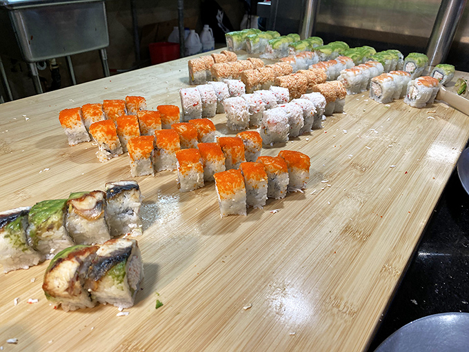 Maki rolls arranged with military precision, their vibrant colors promising flavor explosions that make the drive from anywhere in Arizona completely justified.