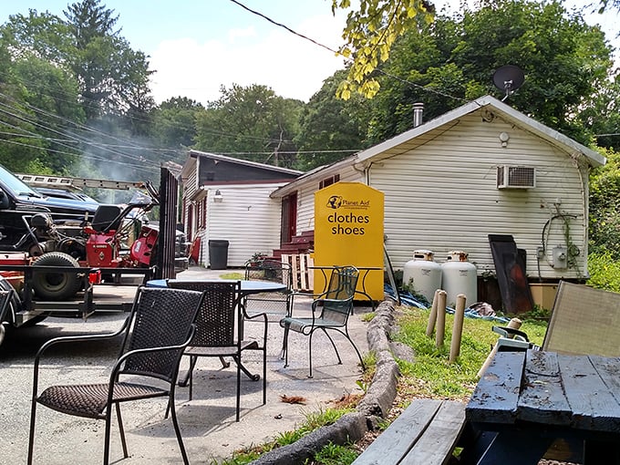 The outdoor seating area has all the charm of your favorite uncle's backyard—casual, welcoming, and promising good times ahead.