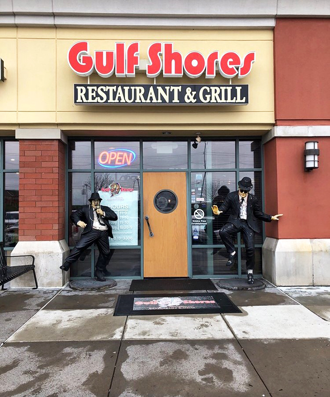 The entrance features Blues Brothers statues standing guard &ndash; silent promises that the food inside is on a mission from God.