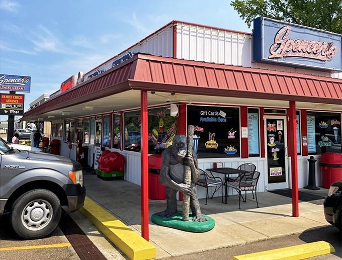 Another sundae masterpiece where hot fudge meets strawberry in a dance of flavors, topped with whipped cream islands and that essential cherry flag.