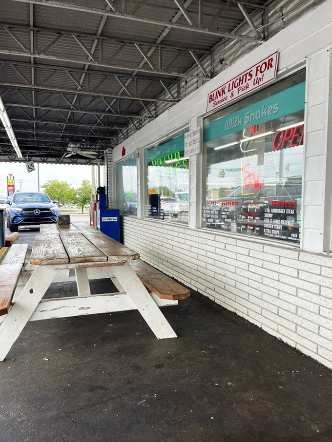 Outdoor picnic tables where summer memories are made. Some conversations just taste better with fresh air and burger juice.