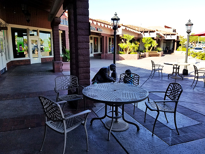 The outdoor seating area offers a moment of desert sunshine between bites, though true deli aficionados know the real action happens inside.