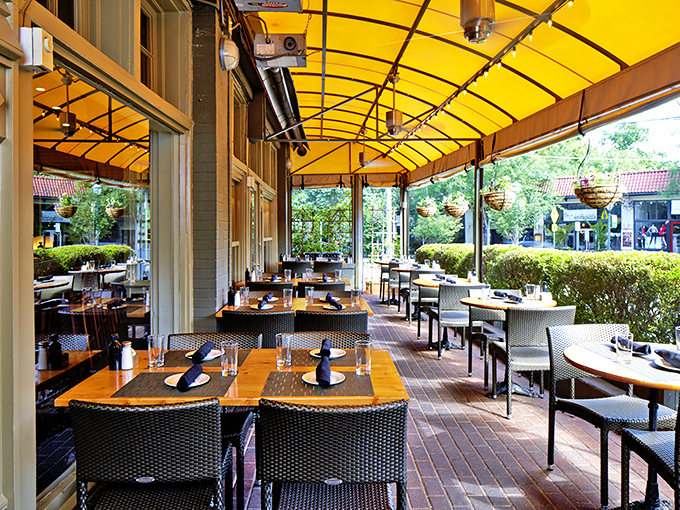 Al fresco dining under cheerful yellow awnings&mdash;where Atlanta's gentle breezes and Murphy's exceptional menu create the perfect urban oasis.