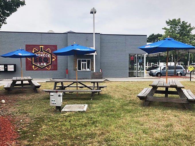 Outdoor seating with blue umbrellas offers a moment to contemplate the miracle that just happened in your mouth, with fresh air to carry away tears of joy.
