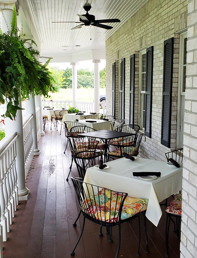 Porch dining that makes you wonder why anyone eats indoors when Missouri weather cooperates. Fresh air makes everything taste better.