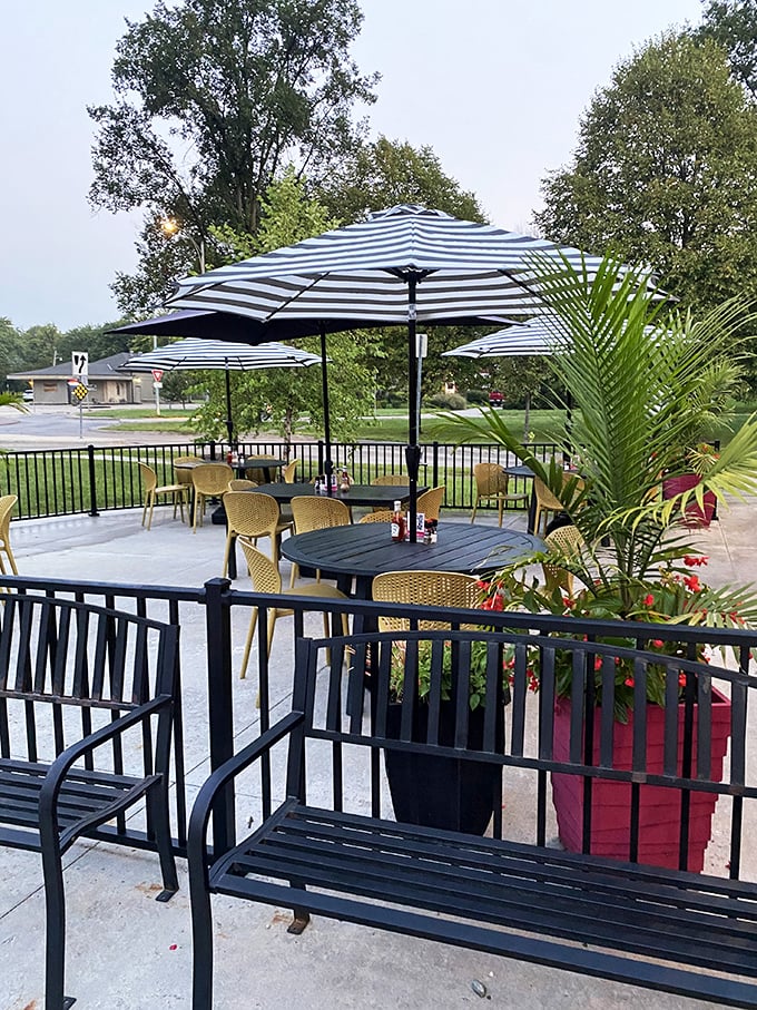 Outdoor dining under striped umbrellas offers a breath of fresh air with your fresh fare. Nebraska sunshine makes everything taste better.
