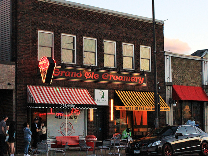 As evening falls, the neon glow of Grand Ole Creamery transforms Grand Avenue into an Edward Hopper painting &ndash; with better dessert options.