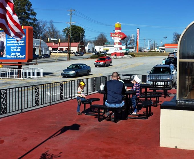 The outdoor seating area offers fresh air, people-watching, and the perfect backdrop for that "I can't believe I ate the whole thing" recovery period.