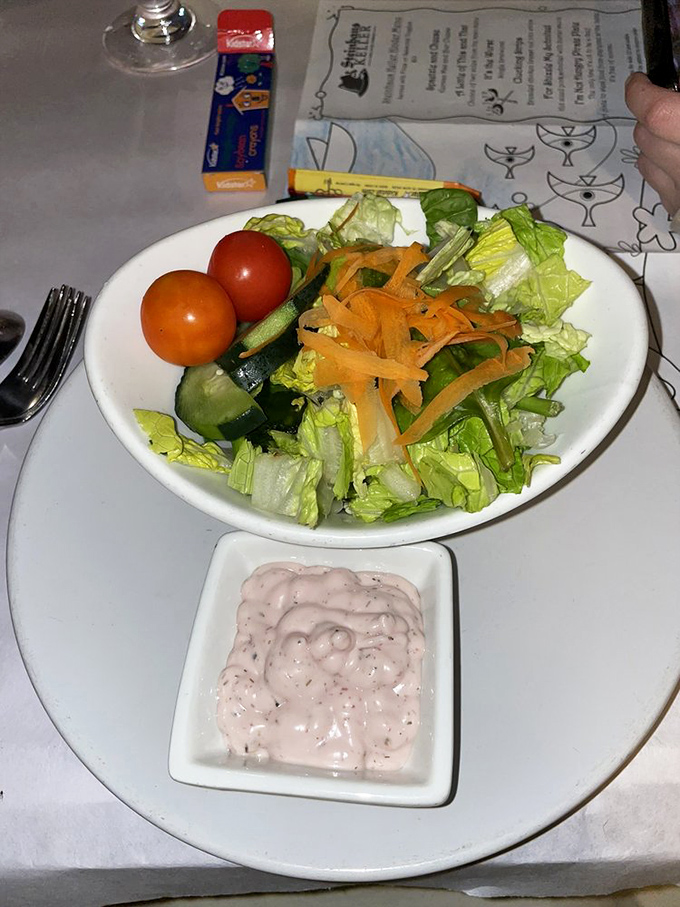 A simple salad with pink dressing standing by&mdash;proof that Germans understand that even vegetables deserve their moment in the spotlight.