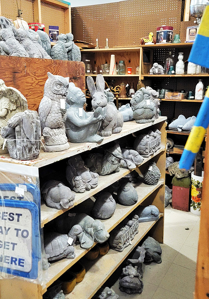 Garden sculptures patiently waiting for their forever homes. These concrete owls have seen everything and are keeping all the secrets.