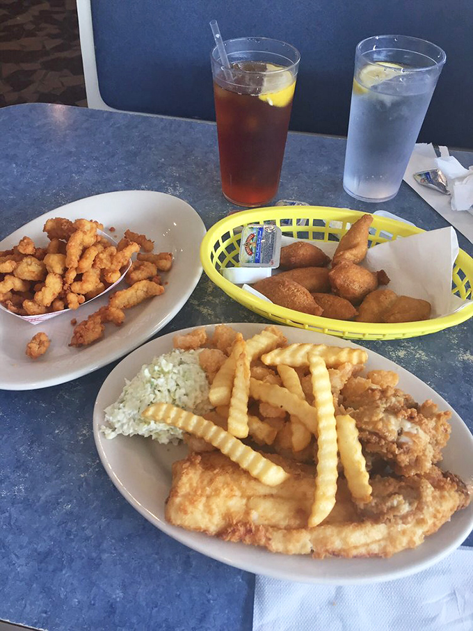 "Share plate" is technically correct, but who's really willing to surrender even one bite of this golden seafood cornucopia?