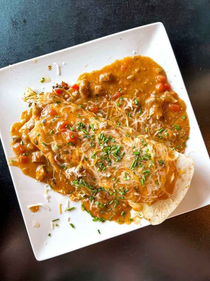 A smothered breakfast burrito that doesn't just say good morning&mdash;it sings it with a full mariachi band of flavors.