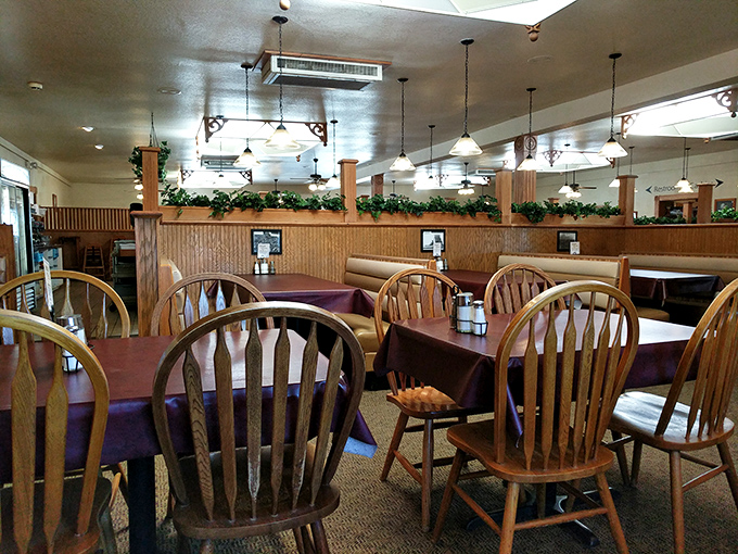 Tables waiting for the next round of food pilgrims seeking comfort and connection. In these wooden chairs, countless stories have been shared between bites.