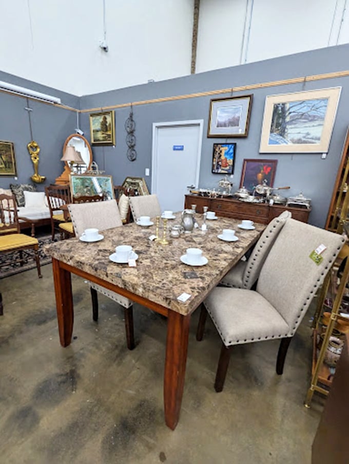 This dining set, staged with perfect place settings, is just waiting for you to host that dinner party where everyone compliments your "eye for finds."