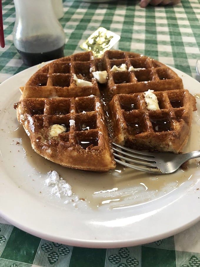 Waffles with perfect grid precision&mdash;creating little pools for butter and syrup in what can only be described as breakfast engineering excellence.