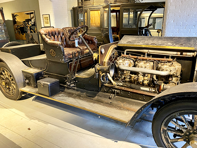 This vintage automobile with its brass accents and wooden wheels represents the dawn of America's love affair with the open road.