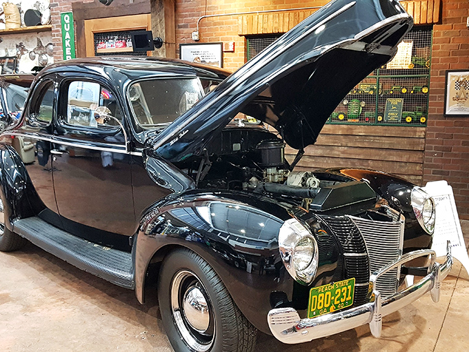 This immaculate 1940 Ford Deluxe Coupe with its hood proudly raised isn't just showing off its engine&mdash;it's revealing the mechanical heart of racing's moonshine roots.