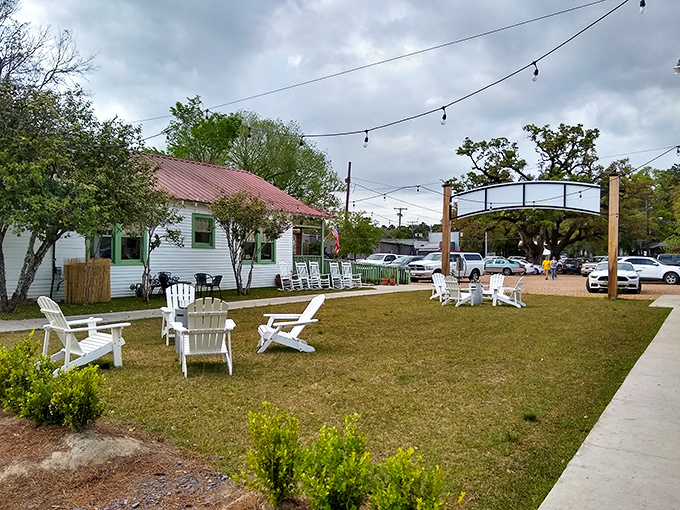 Adirondack chairs arranged for conversation, not Instagram poses. This outdoor gathering space invites you to actually talk to people&mdash;revolutionary concept, I know.