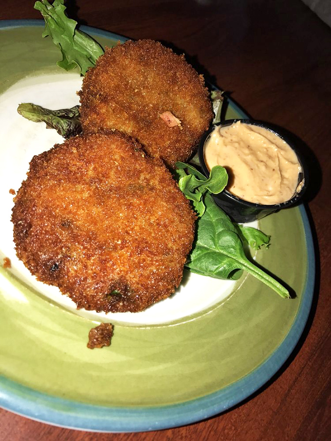 These aren't just fried appetizers&mdash;they're golden-brown discs of joy, crispy on the outside with a savory surprise within.