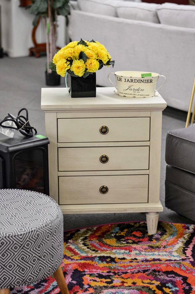 This charming nightstand with fresh flowers could be straight out of a boutique hotel. Your guests will never guess its bargain origins.