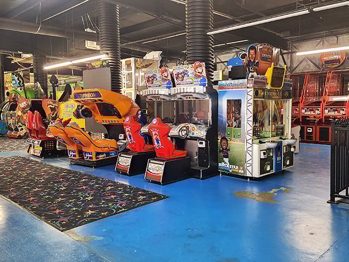 The arcade beckons with flashing lights and nostalgic racing games &ndash; where parents suddenly remember skills they haven't used since the Clinton administration.