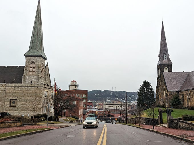 Two church spires reach skyward like exclamation points punctuating Cumberland's architectural paragraph—faith and history in perfect harmony.