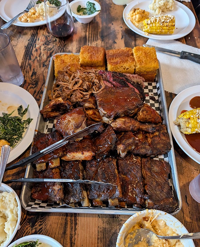 The barbecue motherlode: a tray loaded with ribs, brisket, pulled pork, and cornbread that could feed a family or one very determined meat enthusiast.