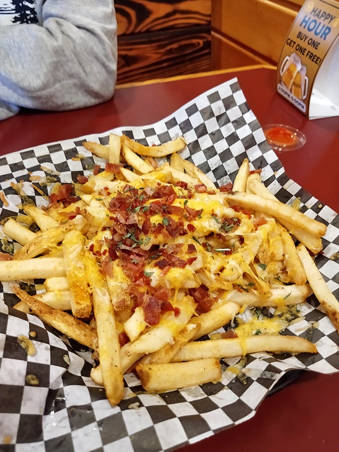 Fries that got all dressed up with nowhere to go except straight to your happy place. Cheese and bacon transform the humble spud.